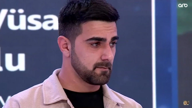 Qazi Adəm ona döyüşdə "Sağ qalsan, məni tap!" deyən hərbçini axtarır ...